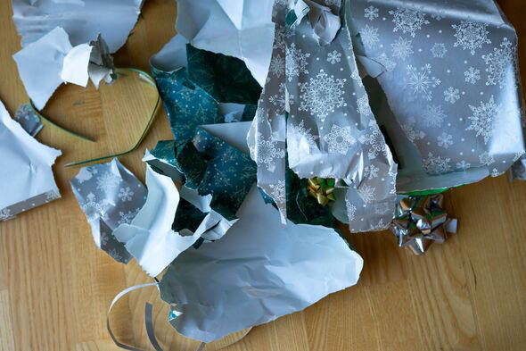 UK households throwing away Christmas wrapping paper, cards and gift ...