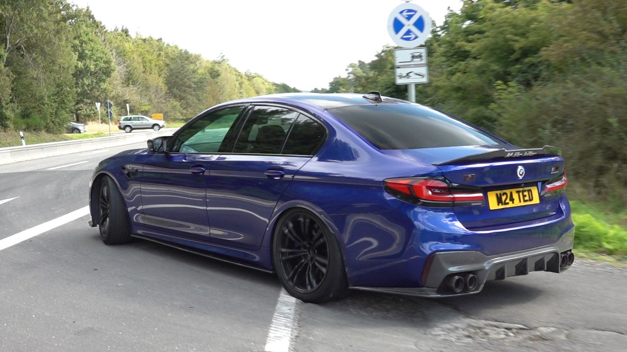 BMW M5 showing strong power as it moves off