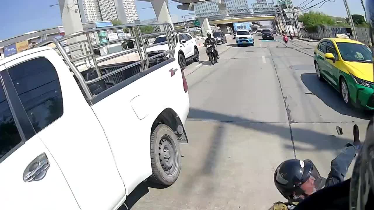 Motorcycle pillion passenger topples backwards when he falls asleep on bike