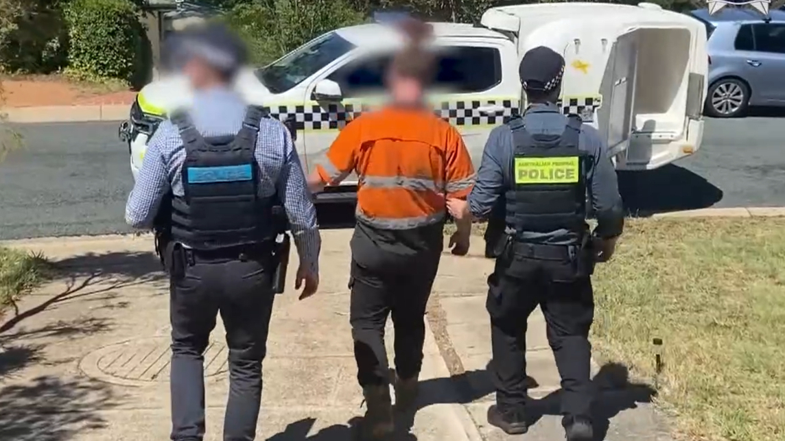 Man faces court over 'Nazi salutes' at suburban shopping centre