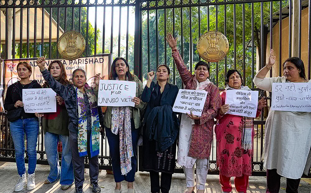 Protesters demonstrate outside Delhi High Court against bail to Kuldeep ...