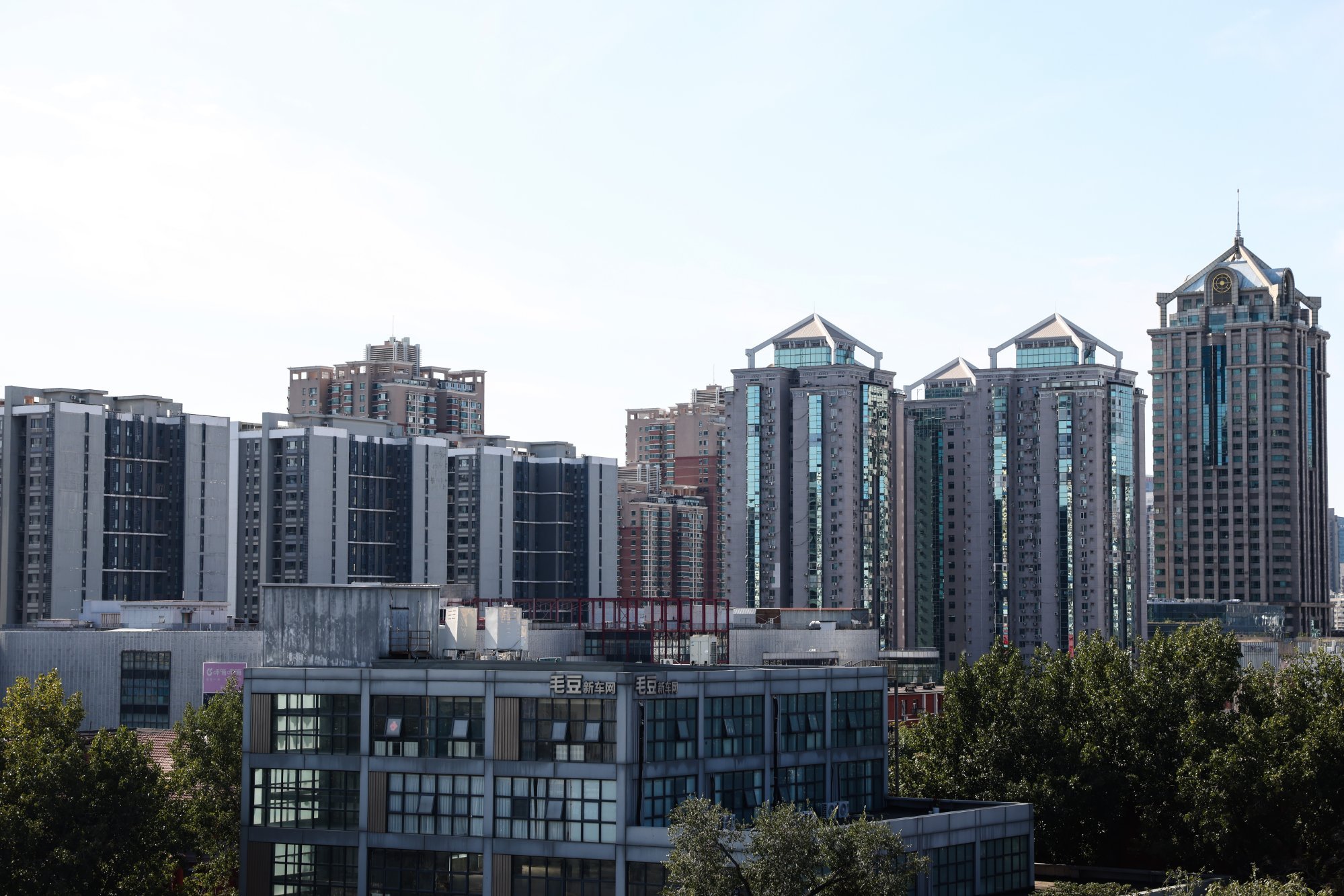 Beijing municipality eases home purchase curbs to shore up sluggish market