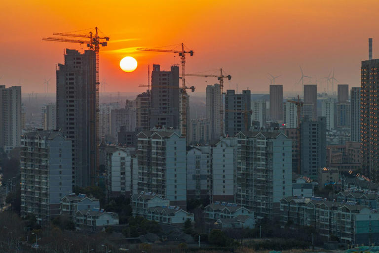 Beijing municipality eases home purchase curbs to shore up sluggish market