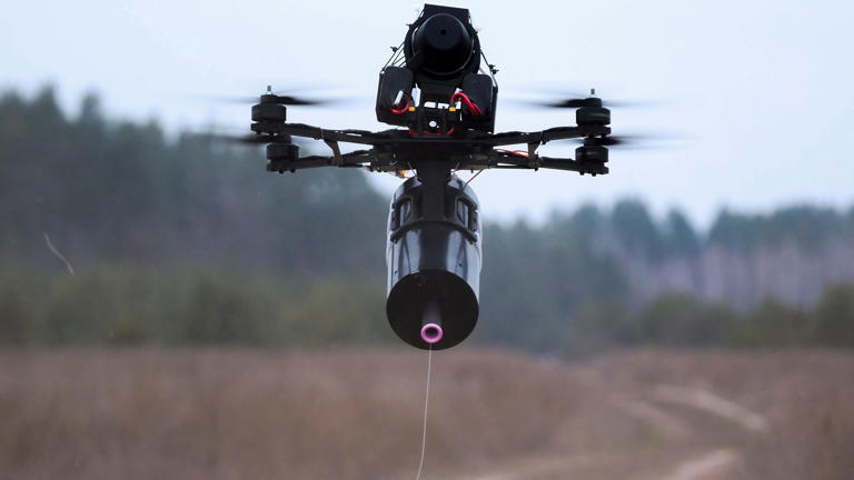 Fiber-optic drones weave spiderweb barriers in Ukraine war