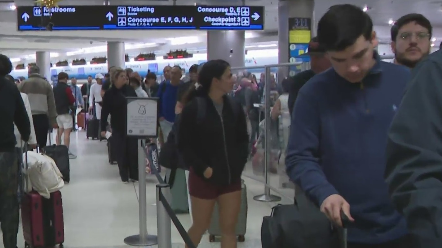 Holiday travel crush hits Miami International Airport as TSA lines ...