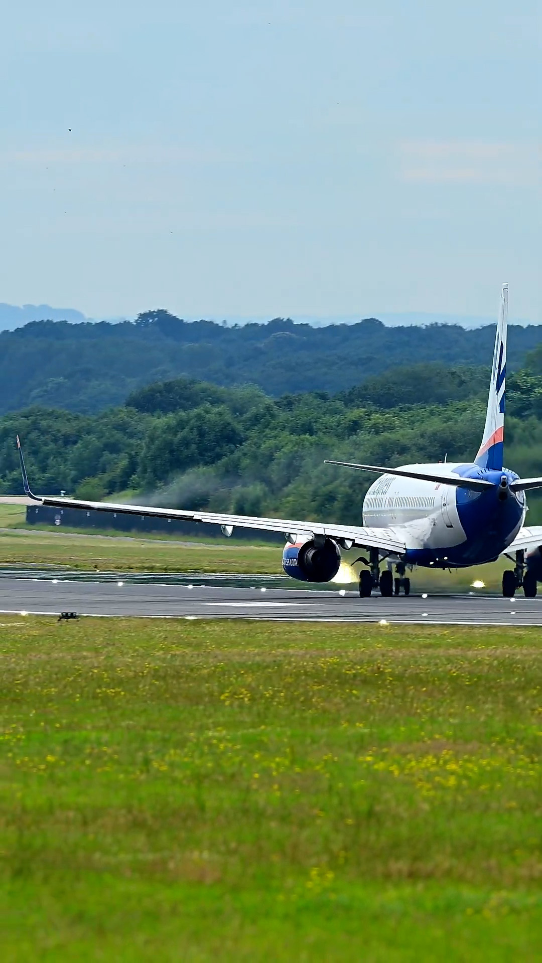Plane releases white vapour during takeoff