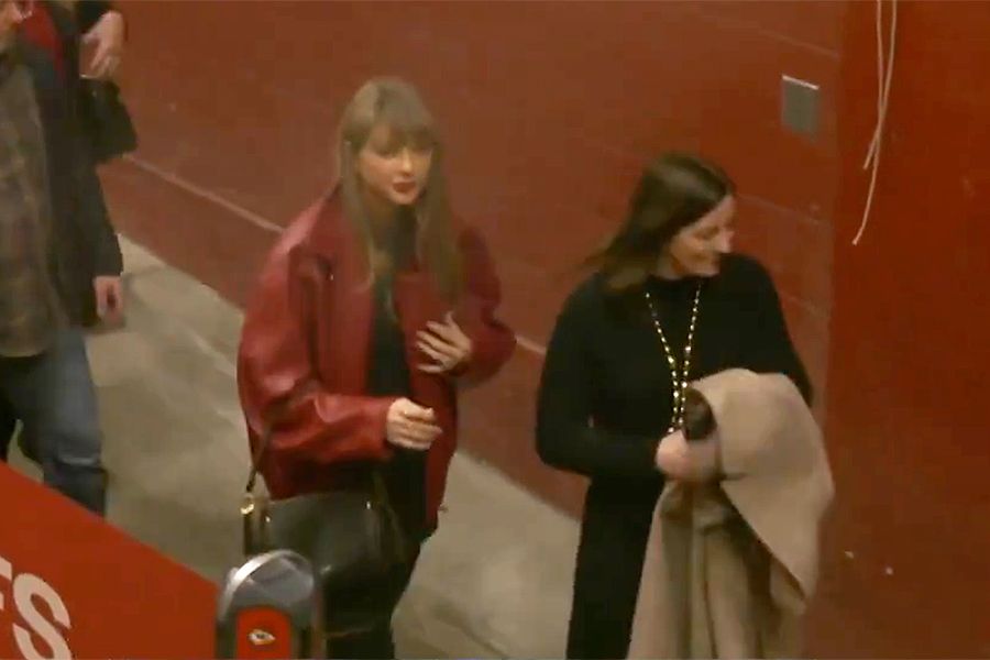 Taylor Swift matches her signature red lipstick to trendy bomber jacket ...