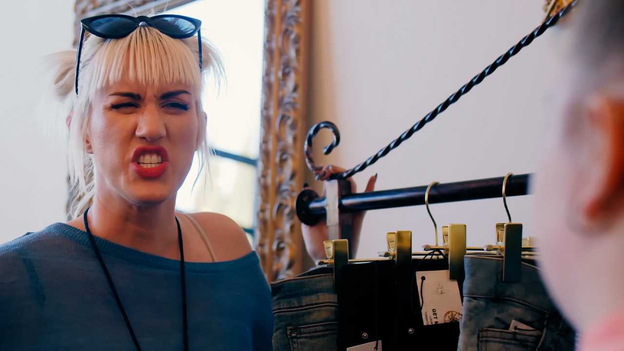 Young woman fat shamed by evil saleswoman