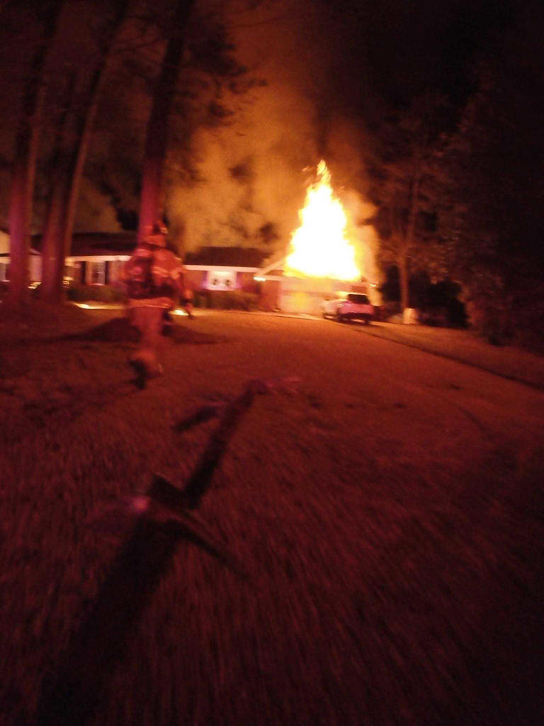 Crews contain house fire after blaze starts in attached garage