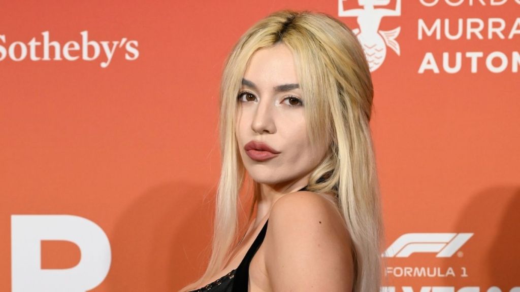 Ava Max Pairs Bodysuit With Sheer Panels With See-Through Tights
