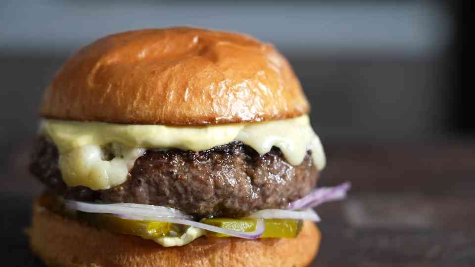 The real reason restaurant cheeseburgers taste better