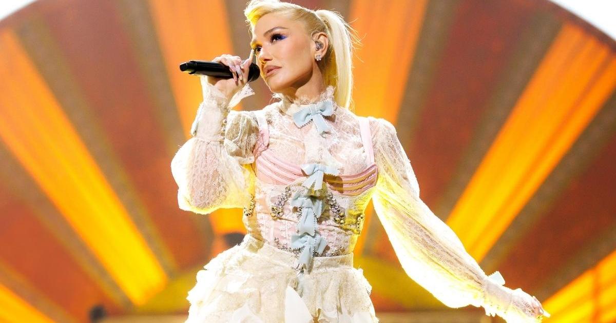 Gwen Stefani in Aadnevik's corset top & sheer tights is flirty & chic