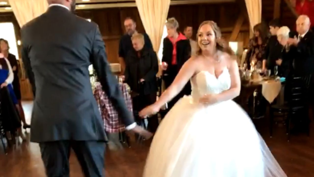Bride loses her footing in the middle of the first dance and creates an ...
