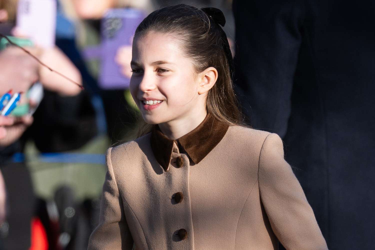 Princess Charlotte, 10, stops for a selfie during royal Christmas walk ...