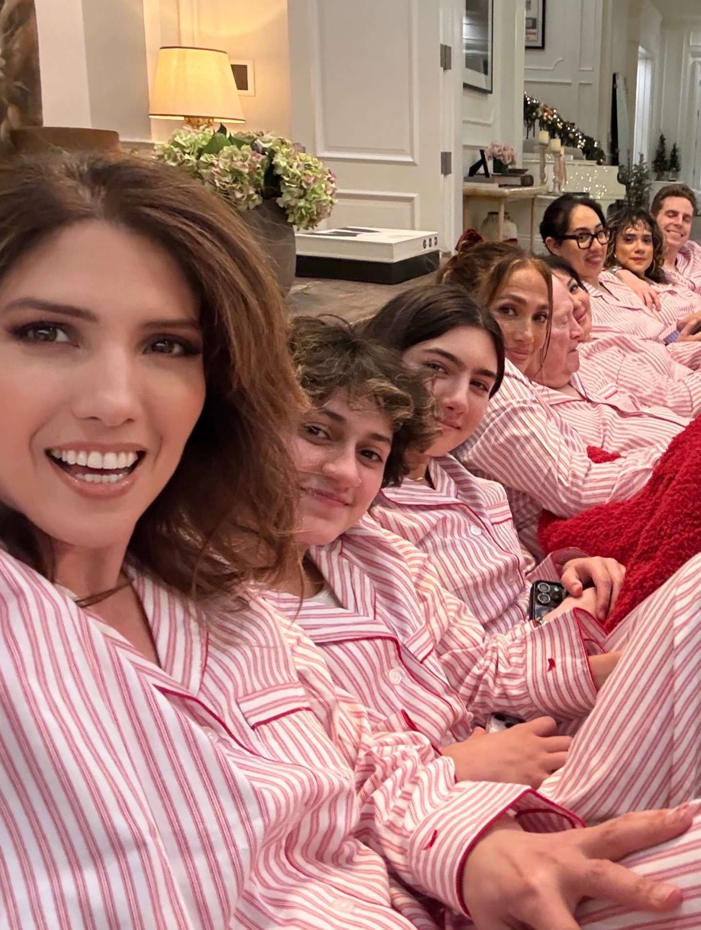Jennifer Lopez celebrates Christmas in curve-hugging sparkles and ...