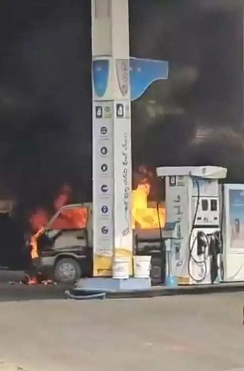 Burning car rolls towards petrol bunk, disaster averted