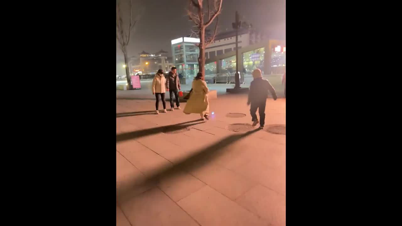 Light-up ball rolls across public plaza, Shaanxi, China