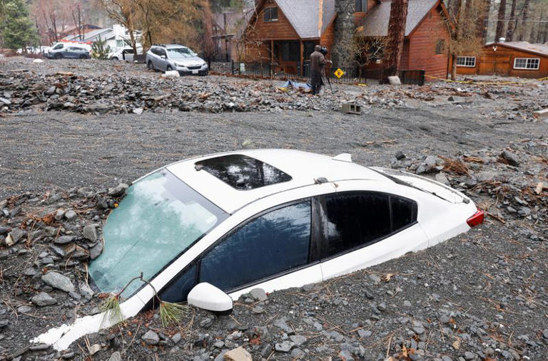 Heavy rains, flash floods leave Southern California homes caked in mud