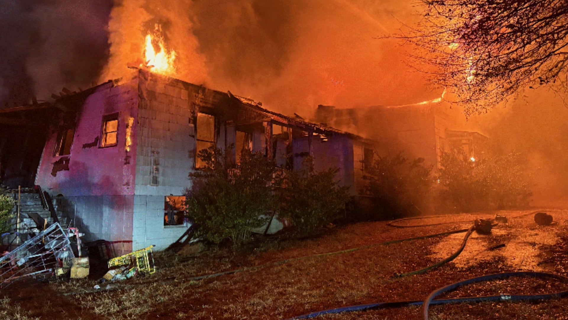 Firefighters rescue person from large house fire in Athens