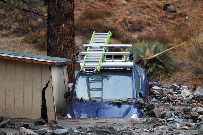 Heavy rains, flash floods leave Southern California homes caked in mud
