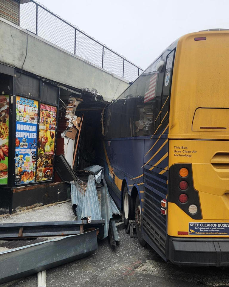 MTA bus crashes into storefront, parked cars in Yonkers
