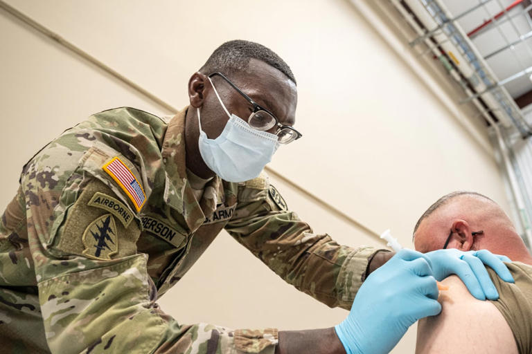 Pentagon offers back pay to US troops dismissed over COVID vaccine mandate