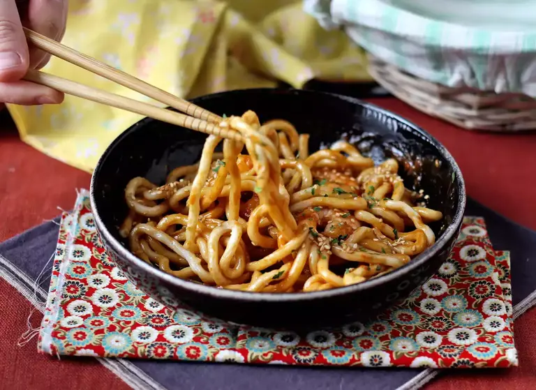 Shrimp udon noodles with spicy peanut sauce