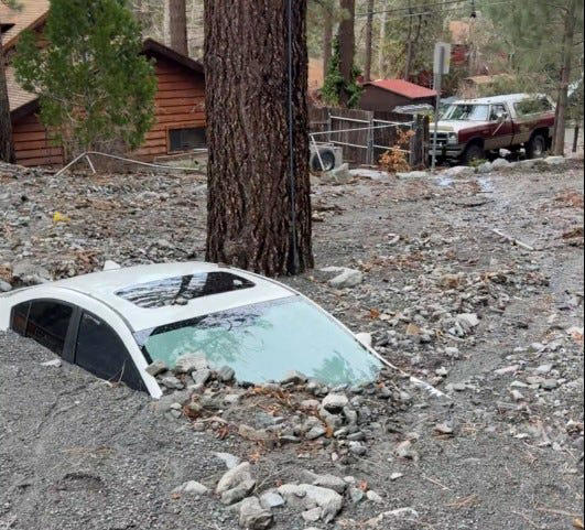 Wrightwood buried in mud, debris in aftermath of flooding. See videos