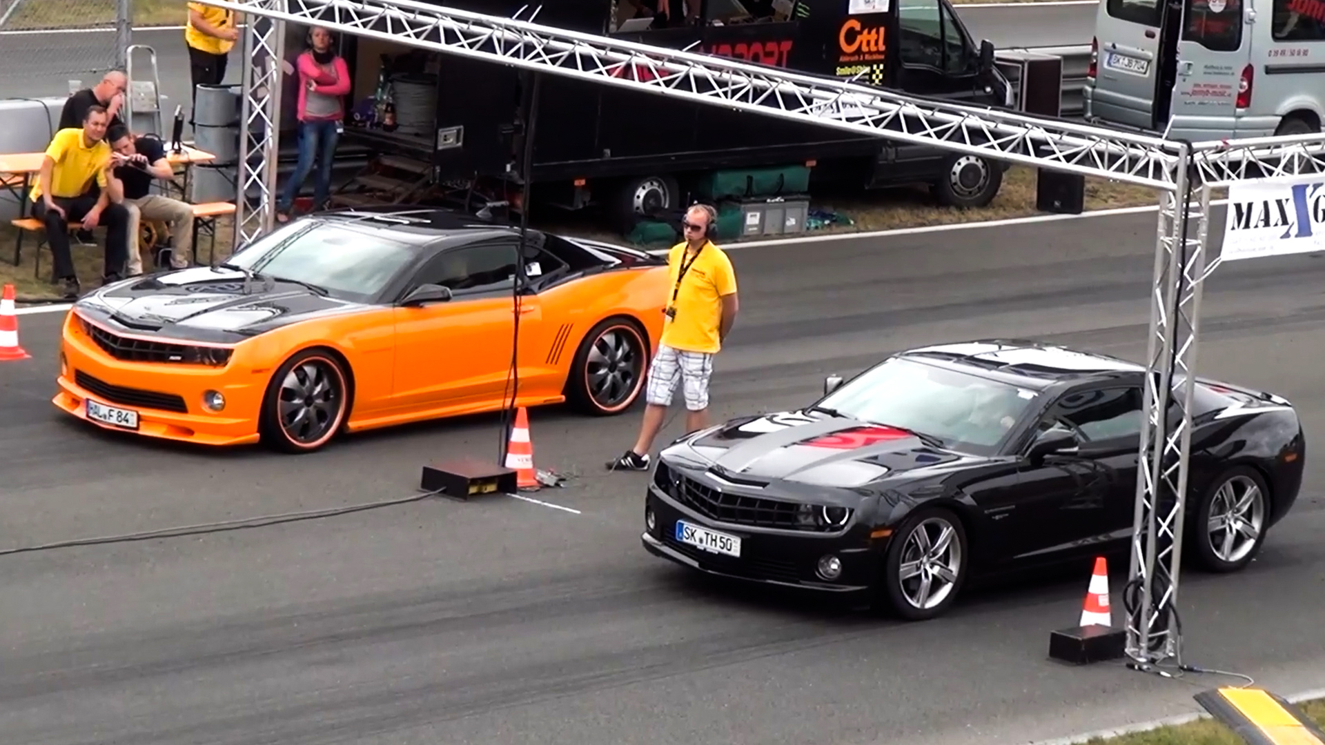 Which Camaro wins the quarter mile drag race?