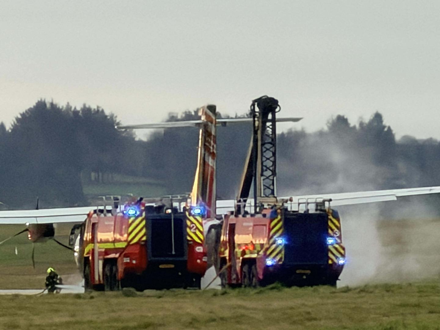 Aberdeen Airport incident: Images show smoke billowing from plane as ...
