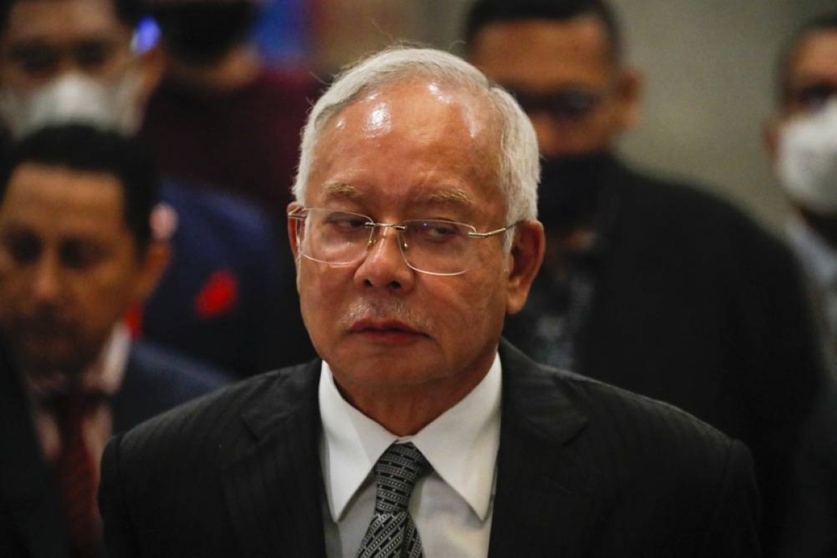 Malaysia's ex-PM Najib convicted of power abuse, money laundering in ...