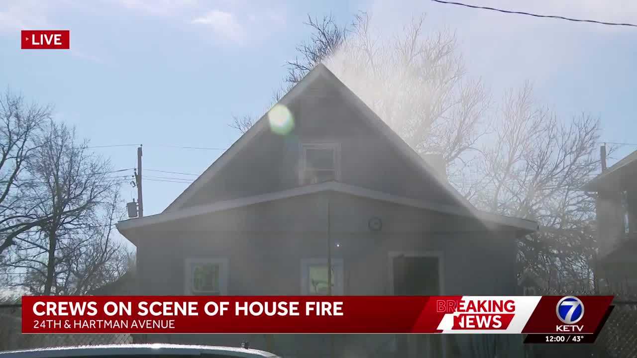 North Omaha fire leaves heavy smoke in air as firefighters work to put ...