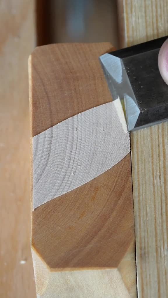 Single perfect shaving on end grain wood with a sharp chisel