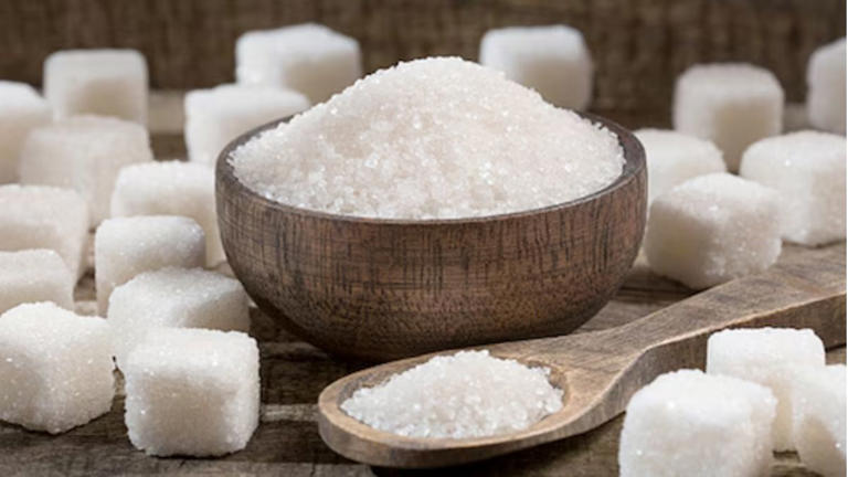 What is the chemical name and formula for sugar?