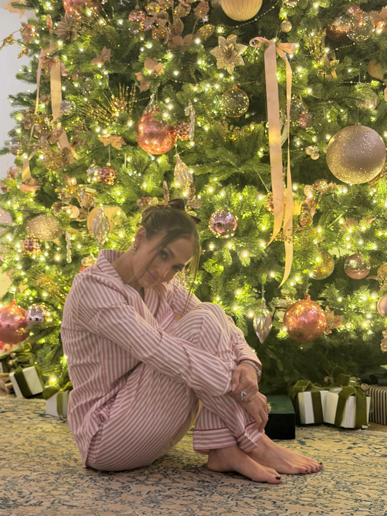 Jennifer Lopez celebrates Christmas in curve-hugging sparkles and ...
