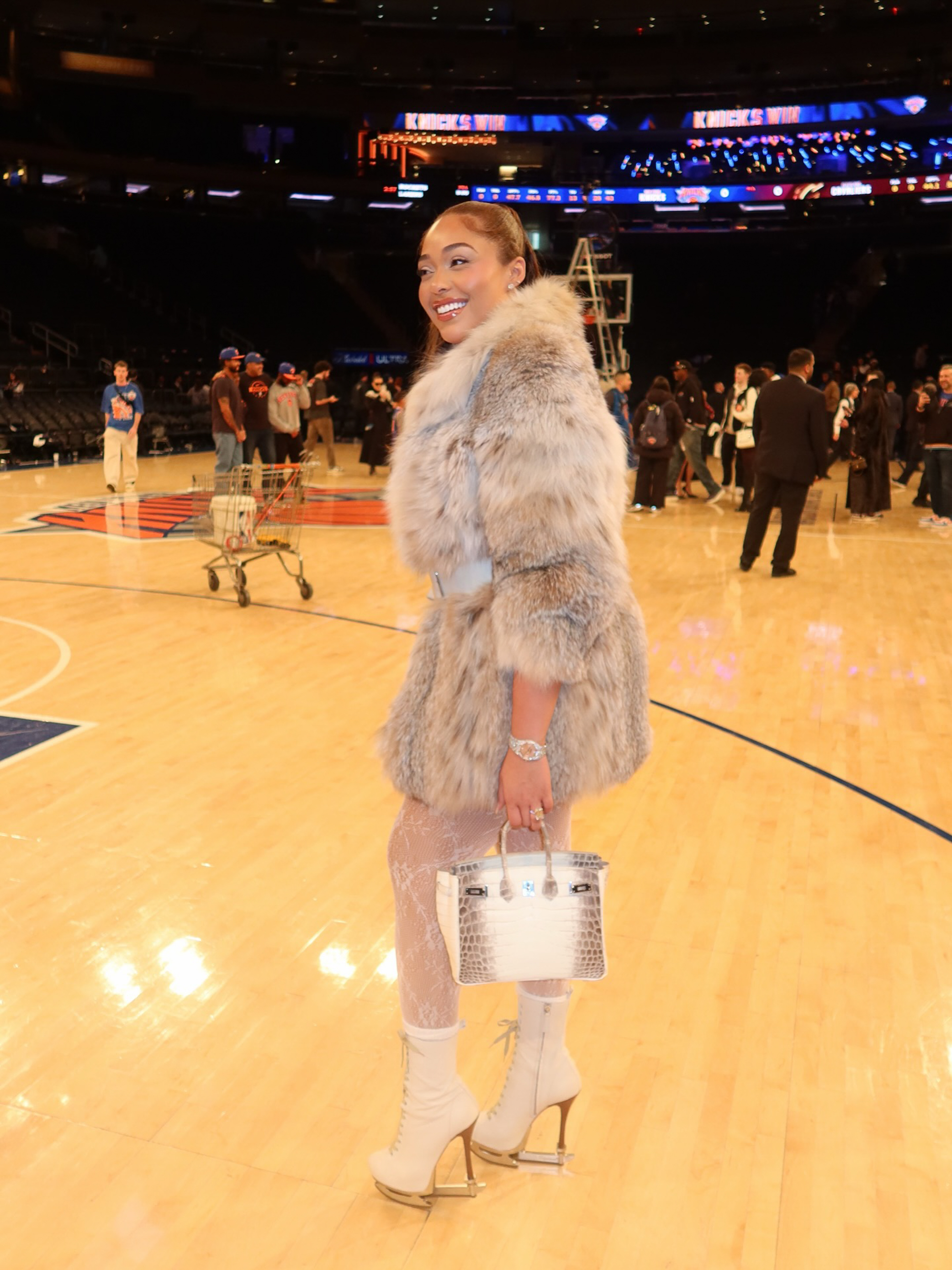 Newly engaged Jordyn Woods pairs $3,190 ice-skate boots with a six ...