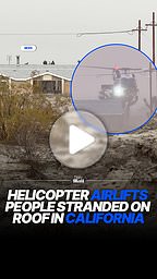 Helicopter airlifts people stranded on a rooftop in California