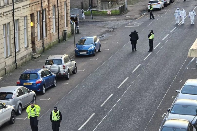 Forensics scour scene of Christmas Day death tragedy in Glasgow street