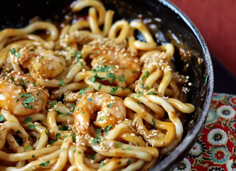 Shrimp udon noodles with spicy peanut sauce