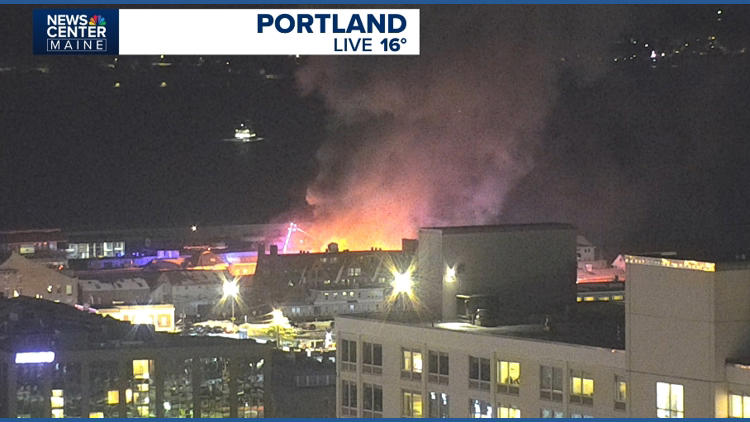 Crews respond to large fire at Custom House Wharf in Portland