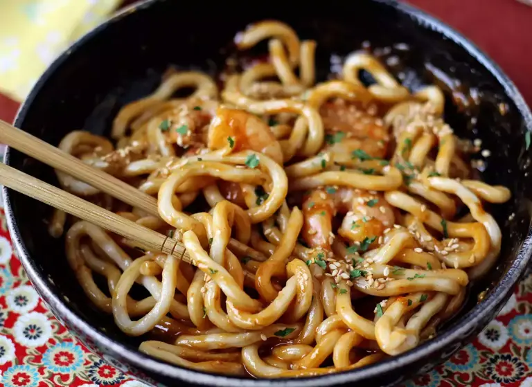 Shrimp udon noodles with spicy peanut sauce