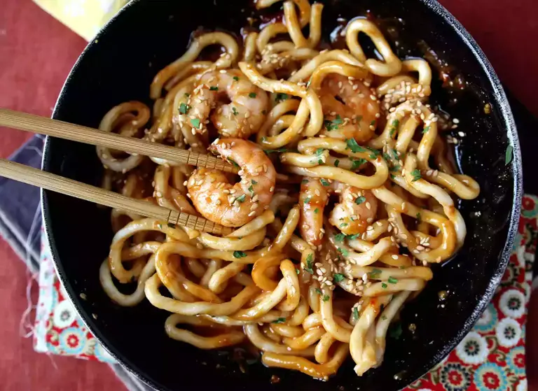Shrimp udon noodles with spicy peanut sauce