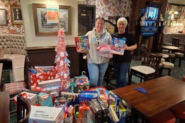 Pub customers help collect 10,000 Christmas presents for children