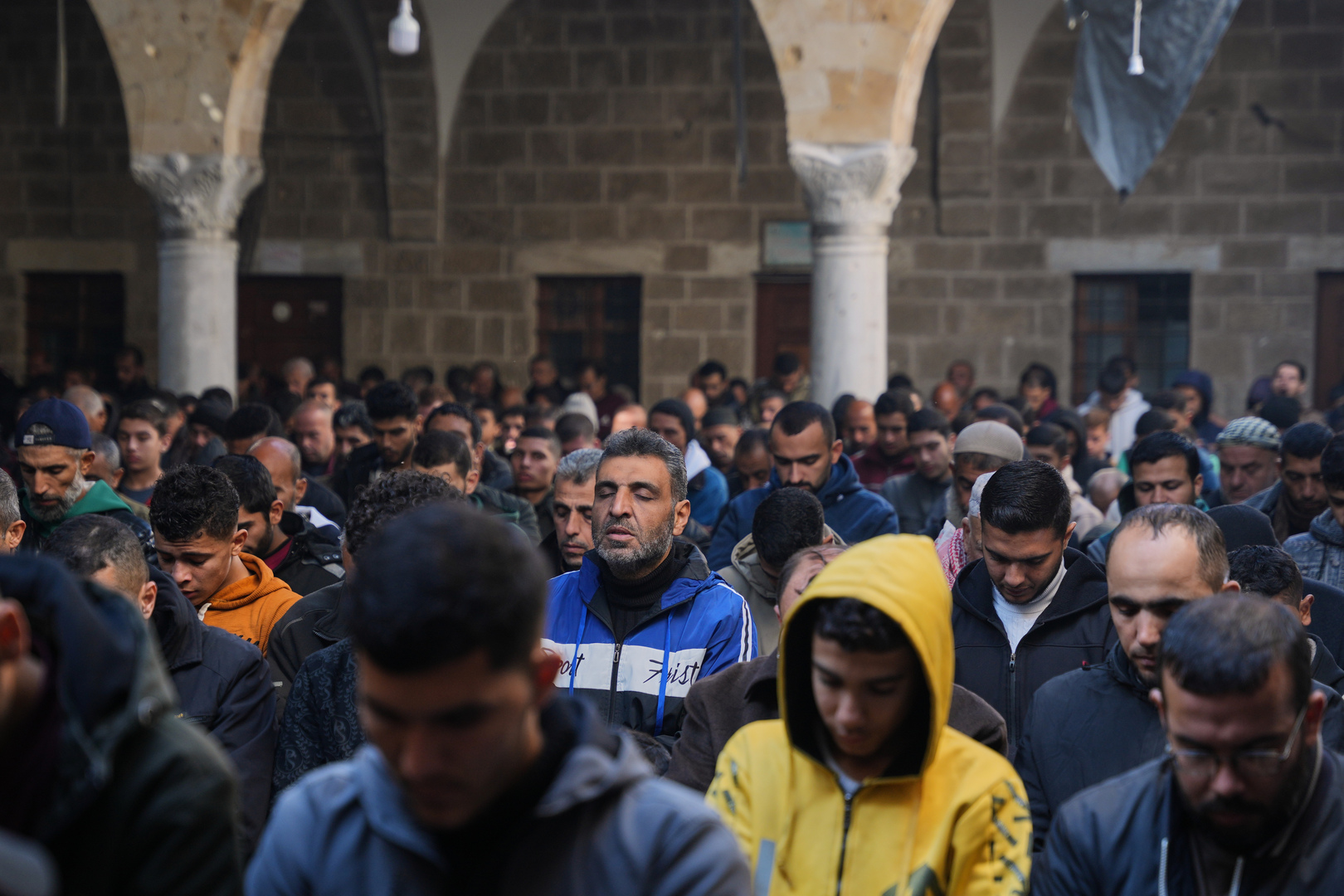 Returning to Friday prayers: Palestinians pray in mosques damaged by ...