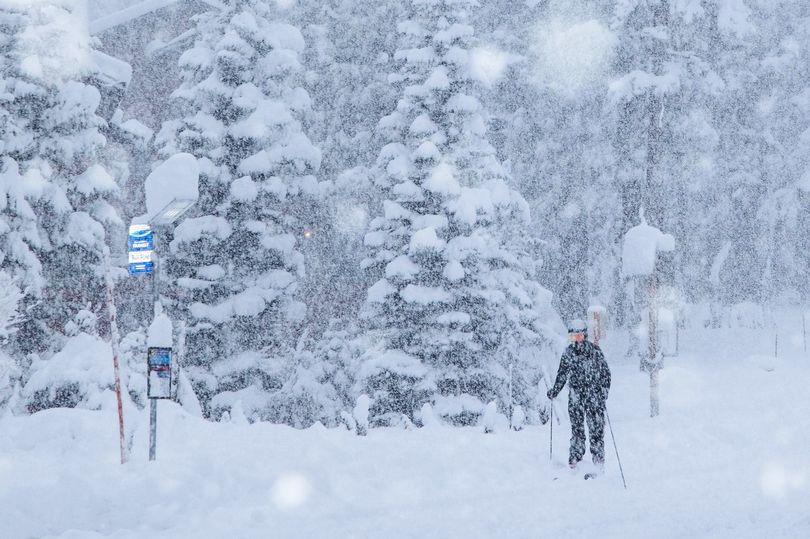 Avalanche buries two California ski patrollers during massive winter storm