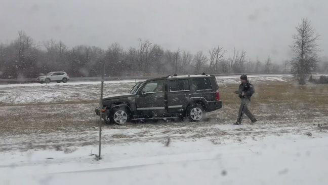 Drivers battle icy roads, sleet as winter storm blankets parts of ...
