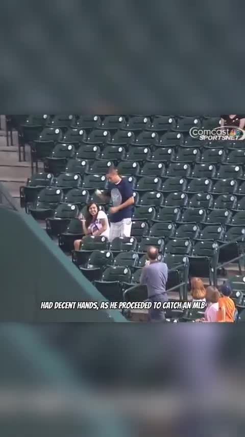 This fan saved his girlfriend from a rogue foul ball