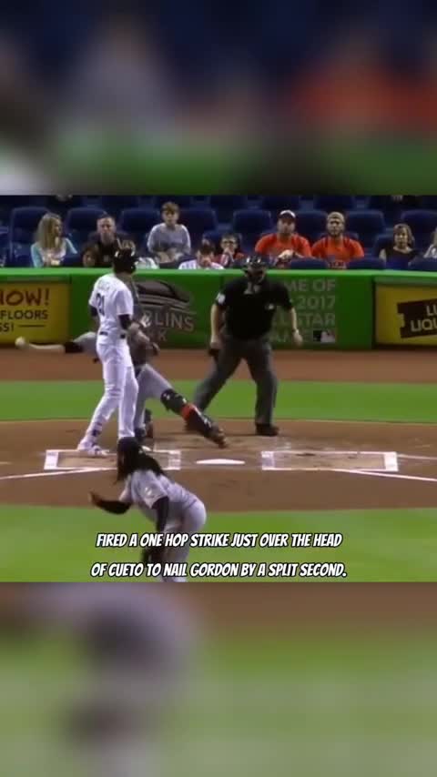 Buster Posey makes a sidearm throw to second base from his knees