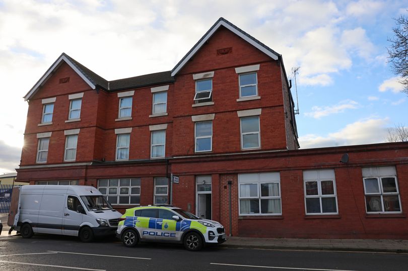 Person taken to hospital after flat fire closes main road