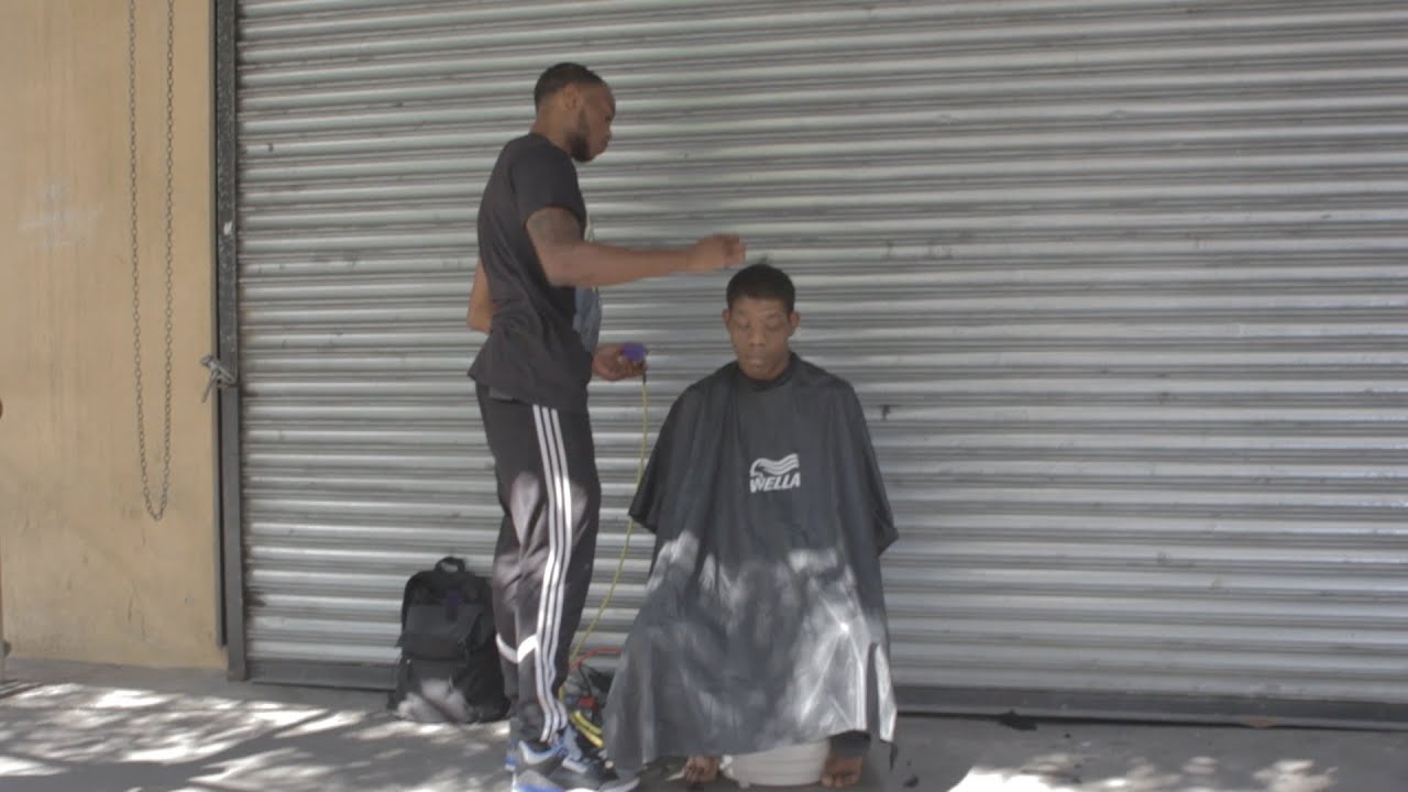 Giving haircuts to the homeless for free